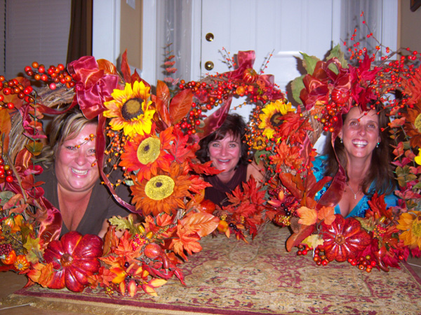 AUTUMN WREATHS. Jenny Zoglio, Richelle Jones and Julie Hebert pose with ...