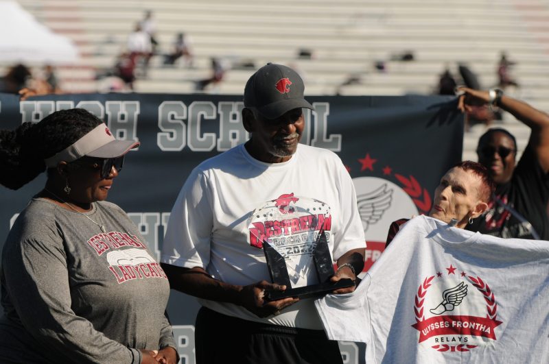 DHS surprises longtime track and field coach